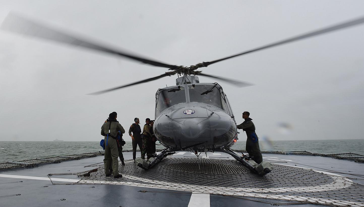 AirAsia Flight QZ8501: Plane may have landed on water, overcome by high ...