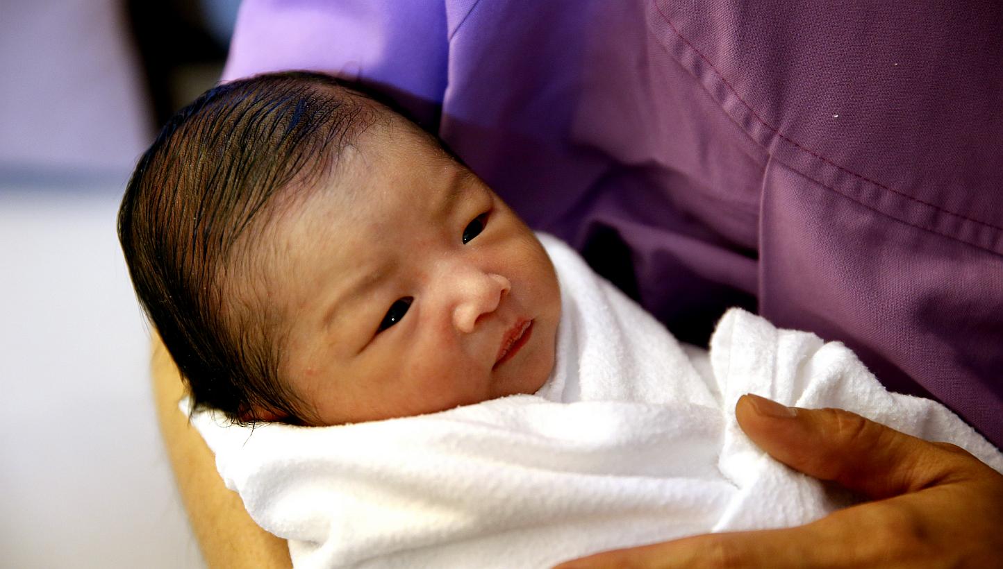 It's a girl - Singapore's first Jubilee baby born at stroke of midnight ...
