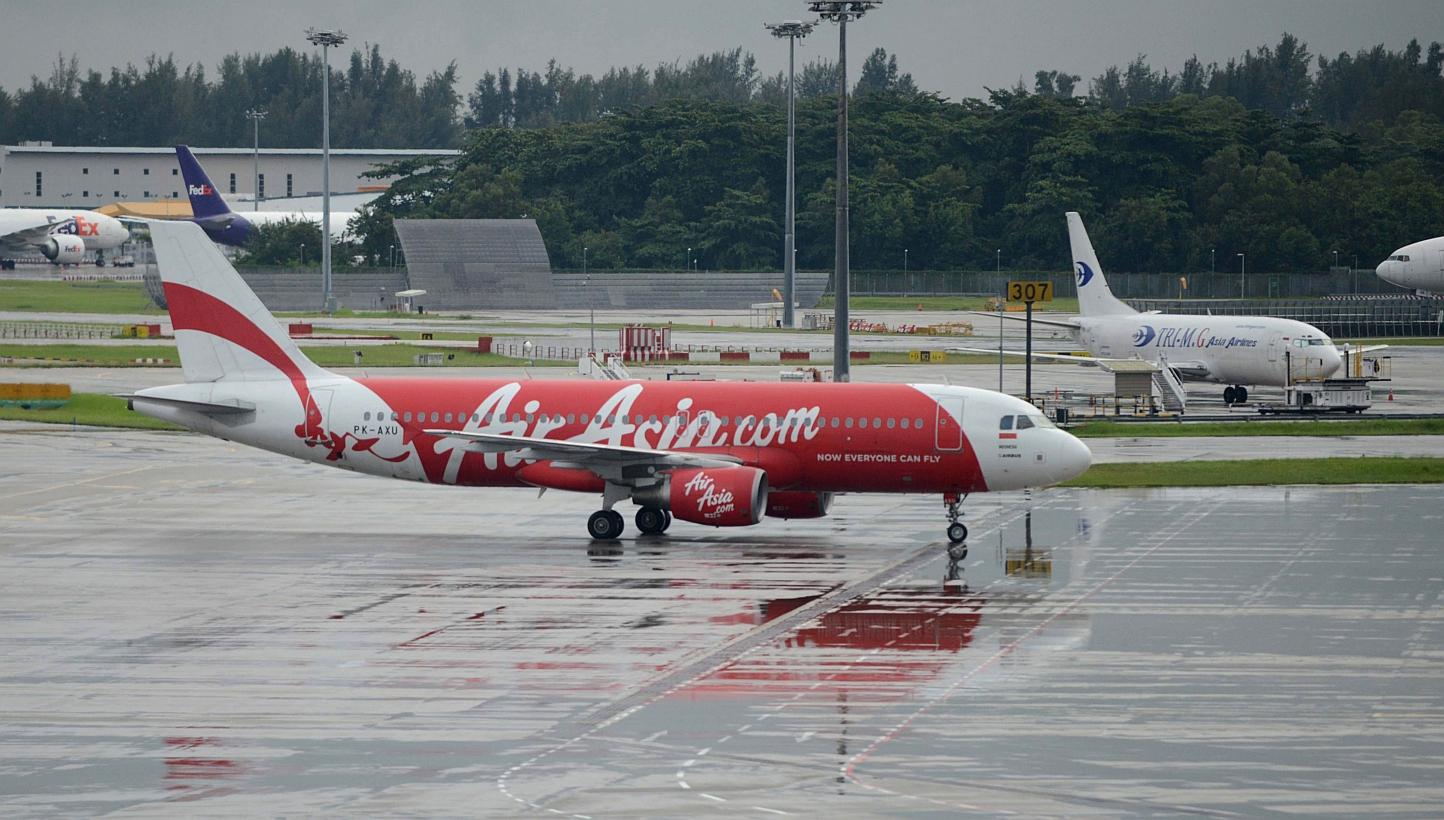 AirAsia flight QZ8501: Pilots didn't get required weather report before ...