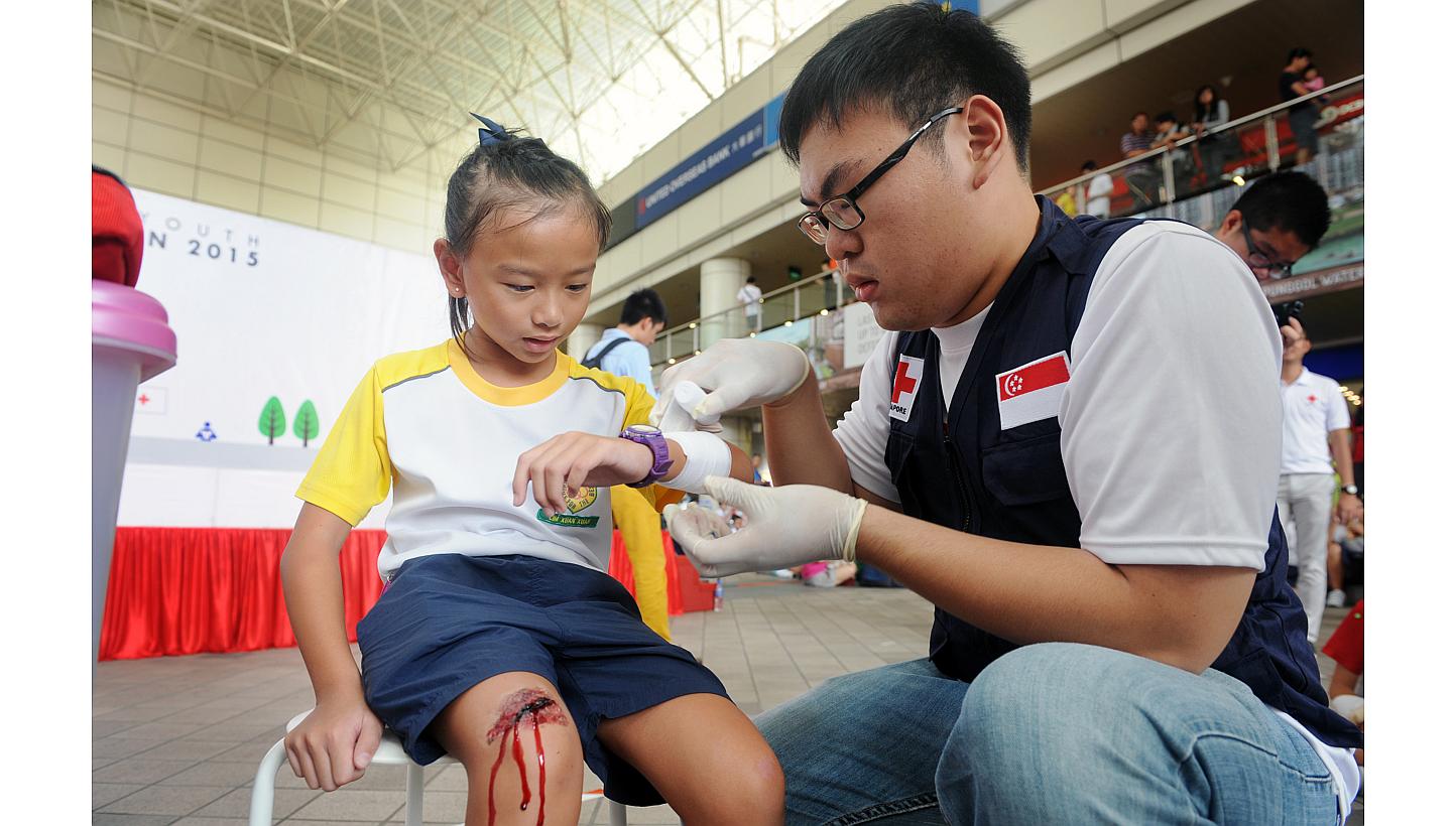 Students show off their first aid skills in Singapore Red Cross ...