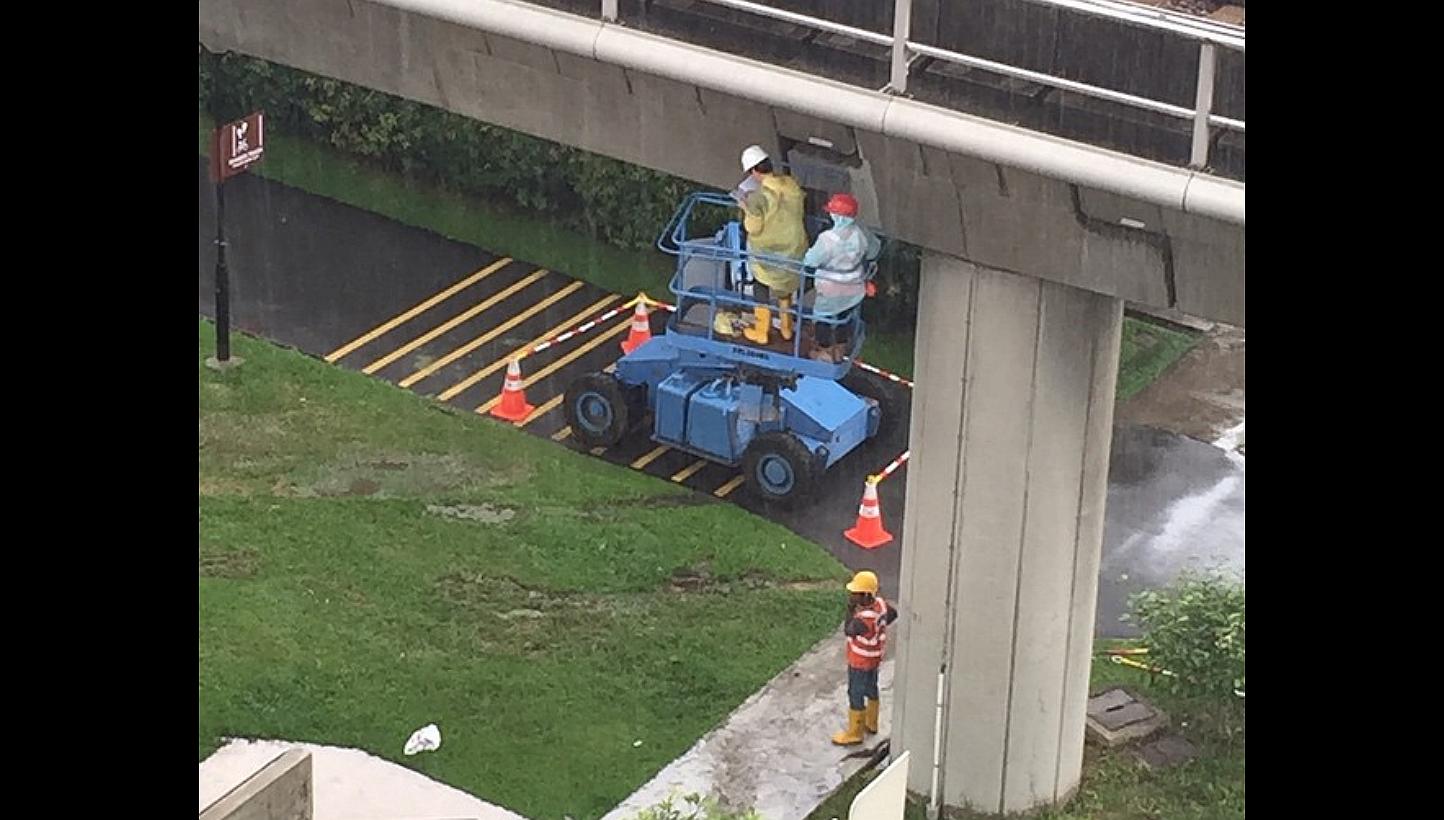 Photo of men working under MRT track causes confusion among netizens ...