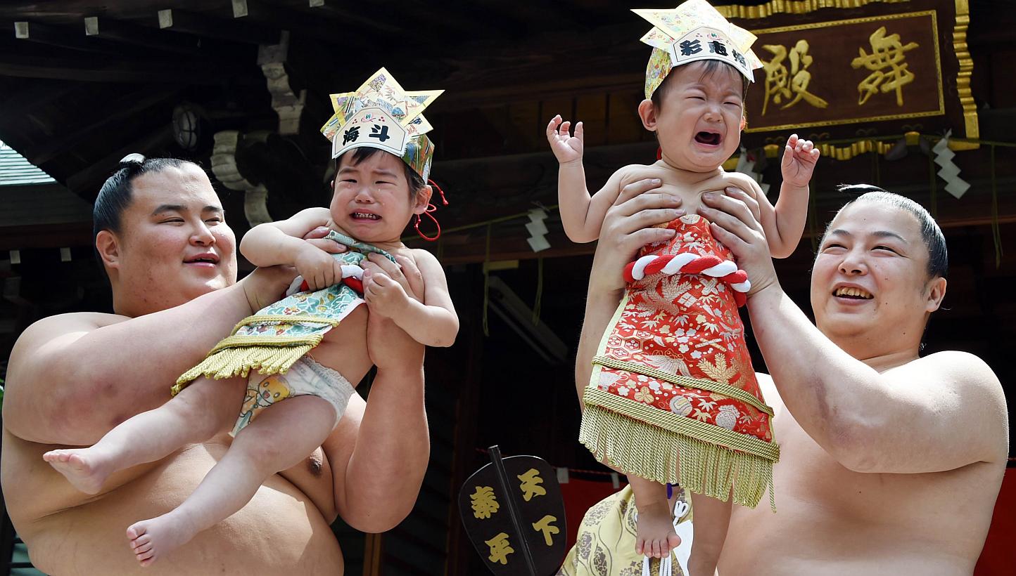 Tearful toddlers battle in Japan's annual 'crying sumo' contest | The ...