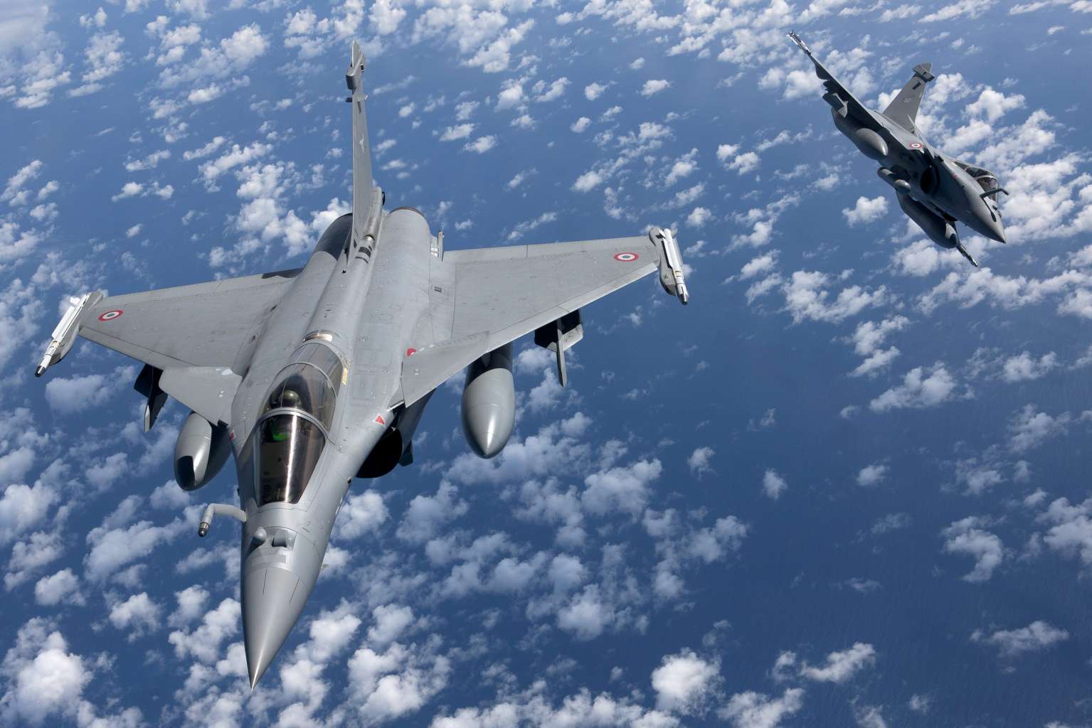 Paris attacks: France mourns dead as warplanes pound ISIS stronghold in ...
