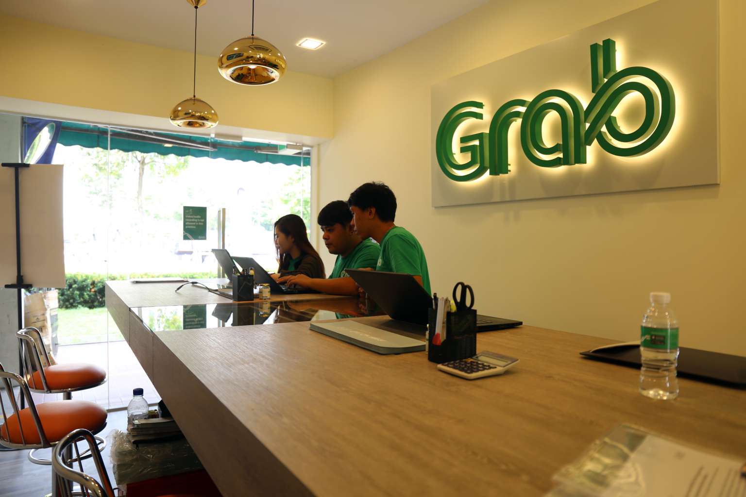 Ride-hailing firm Grab opens new driver support centre in Jurong East ...