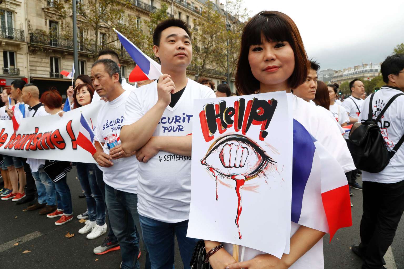 Ethnic Chinese demand 'security for all' in Paris protest | The Straits ...