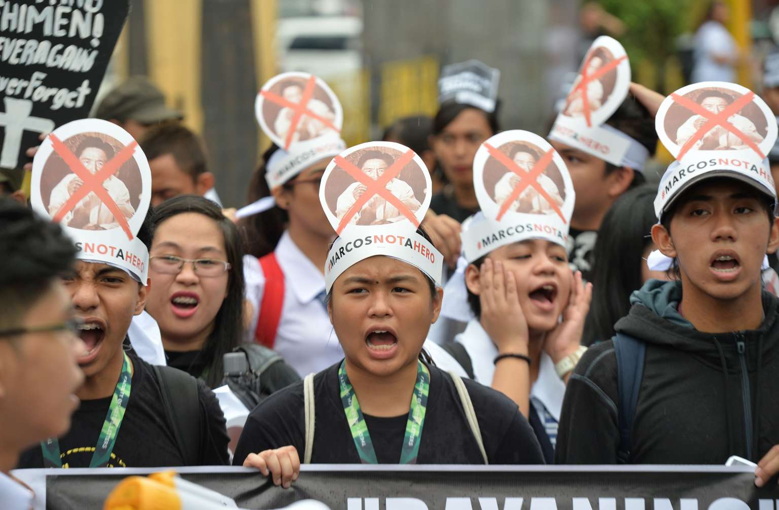 Thousands of anti-Marcos activists stage 'Black Friday' protest across ...