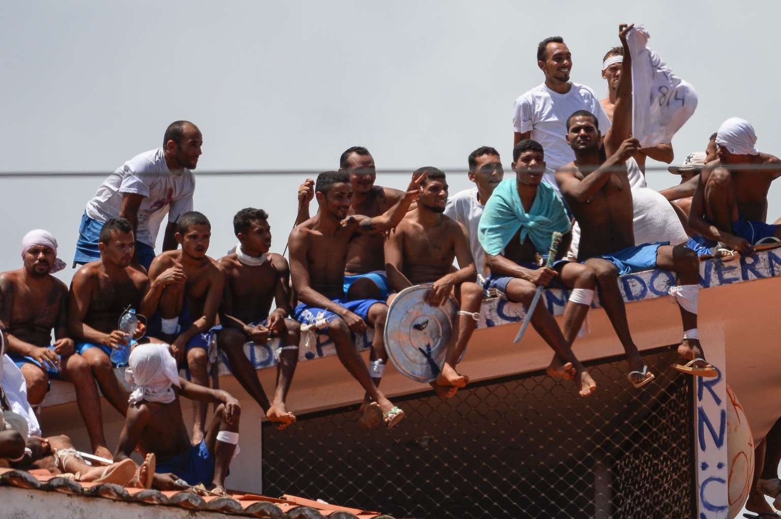 Brazil police chase inmates off jail roof after killings | The Straits ...