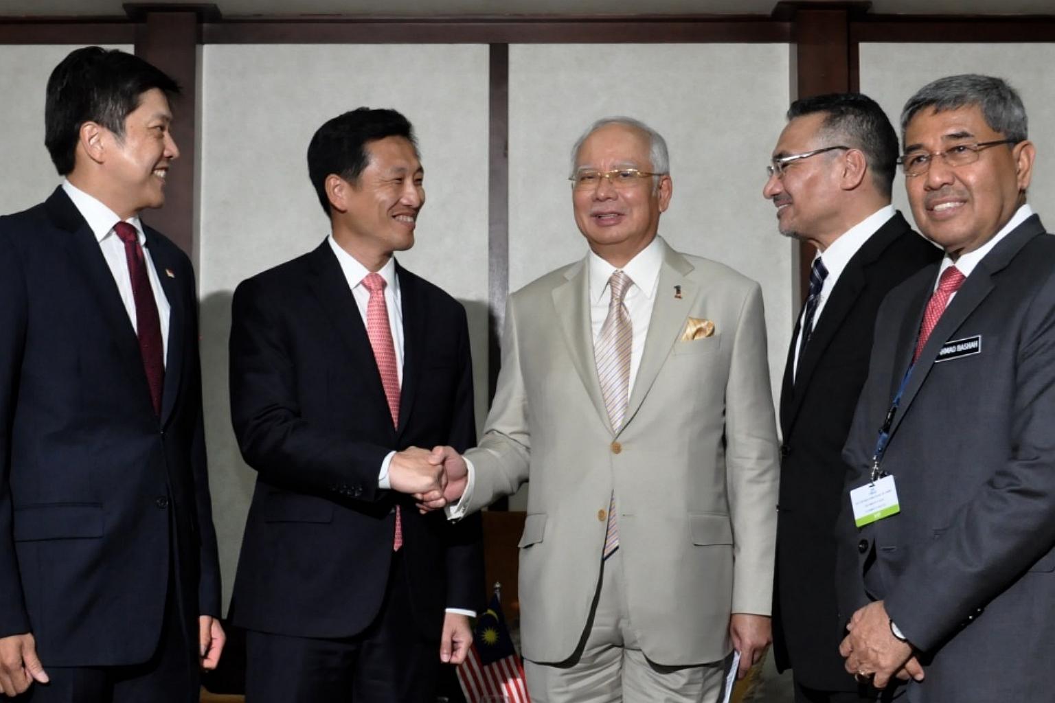 Ong Ye Kung, Ng Chee Meng meet Malaysian PM Najib, Defence Minister ...