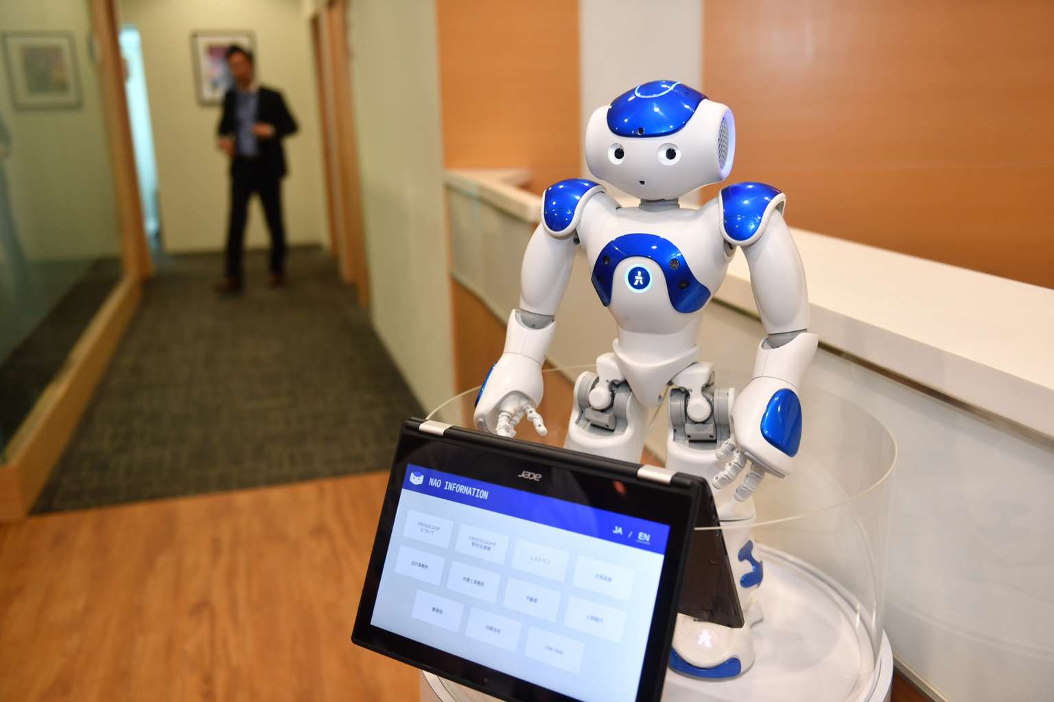 Humanoid robot NAO takes on receptionist tasks at rental office firm ...