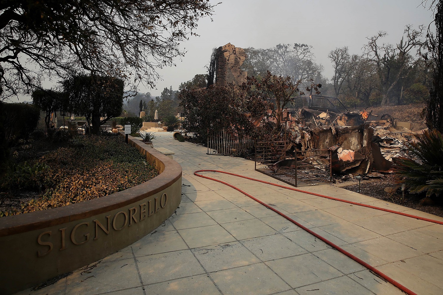 Deadly fires tear through iconic California wine country, damage ...