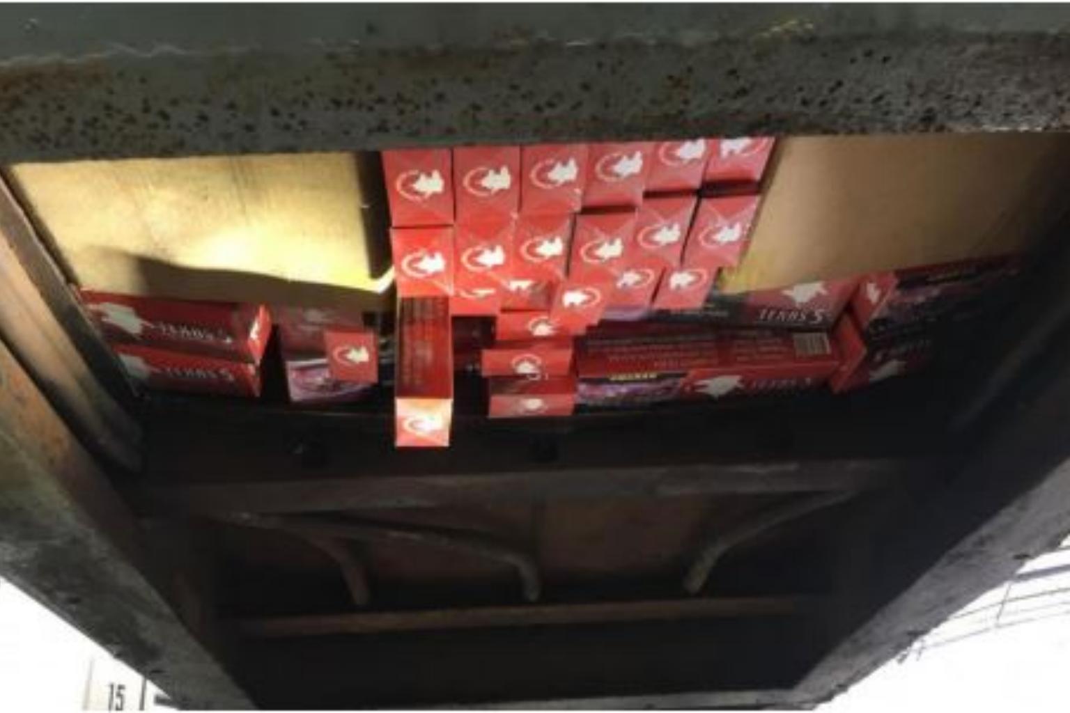 Malaysian man caught smuggling 2,190 cartons of cigarettes in modified ...