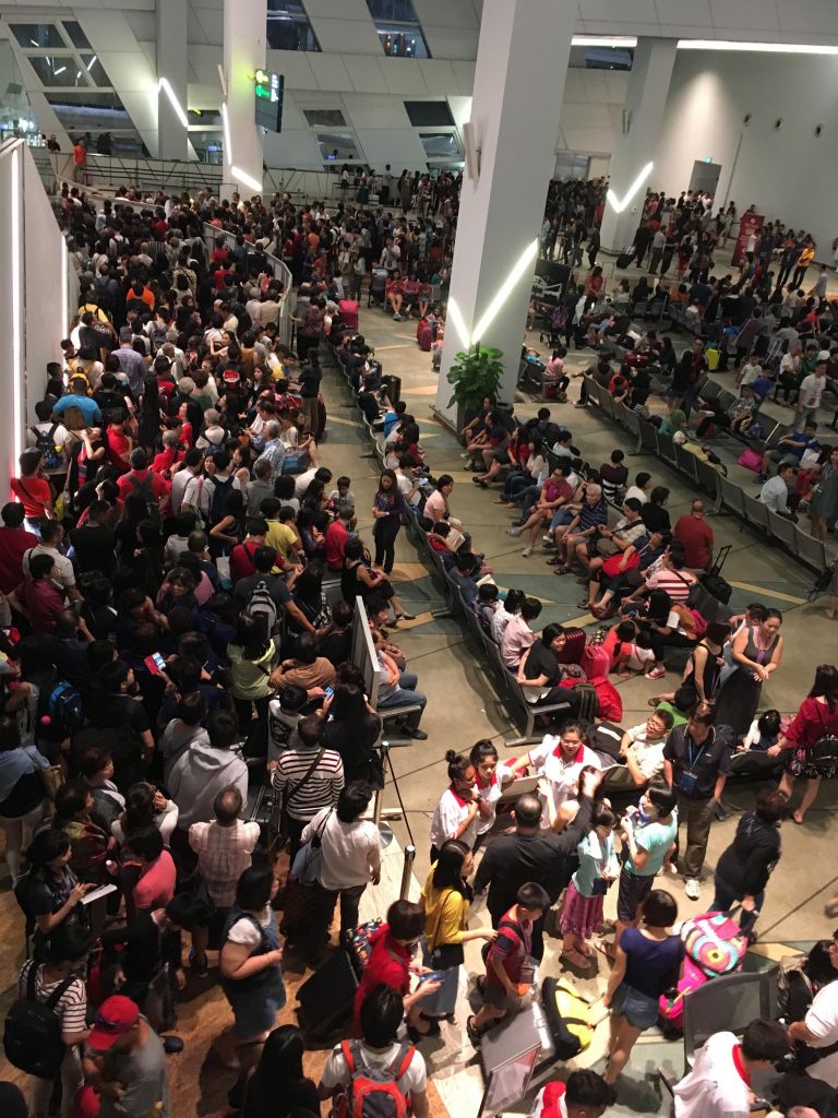 Long queues at Marina Bay Cruise Centre due to boarding delays for ...