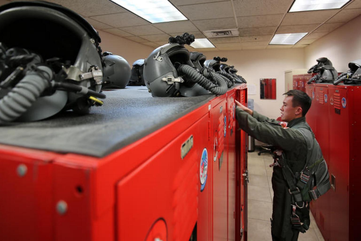 Serving the country by flying, and having a baby | The Straits Times