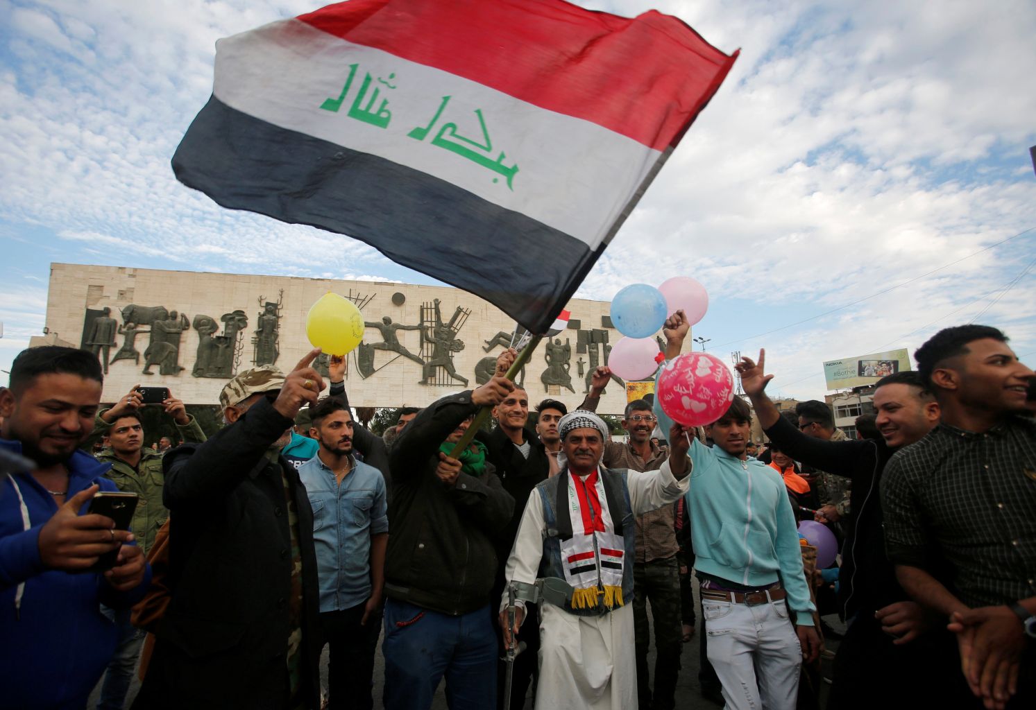 Iraq holds military parade to celebrate victory over ISIS | The Straits ...
