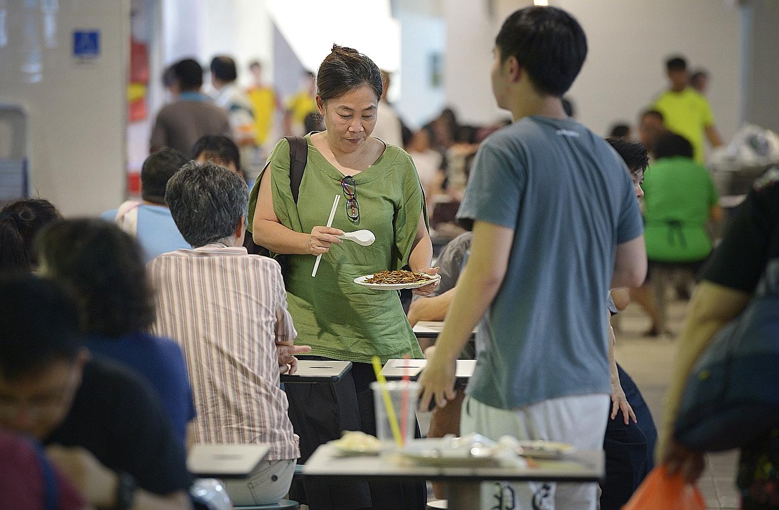 Customers find ways around tray return system | The Straits Times