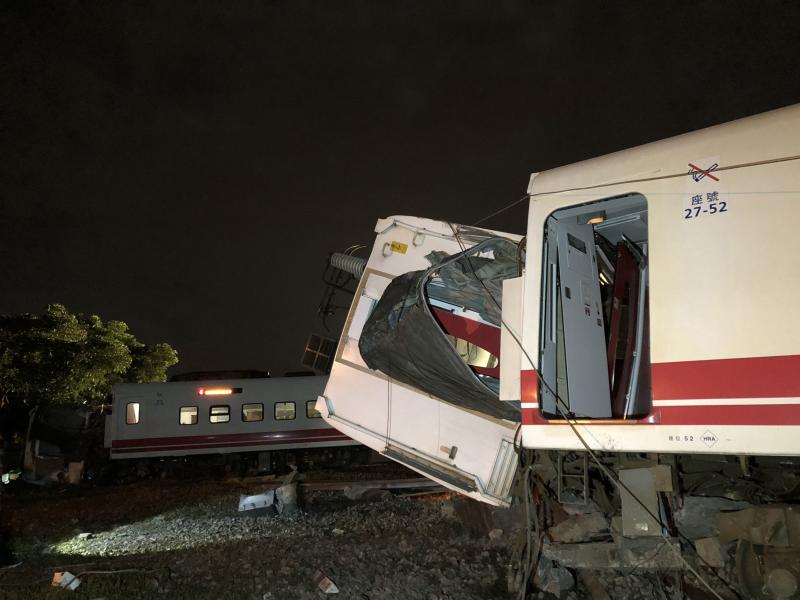 At least 18 dead after train derails in Taiwan's worst rail disaster in ...