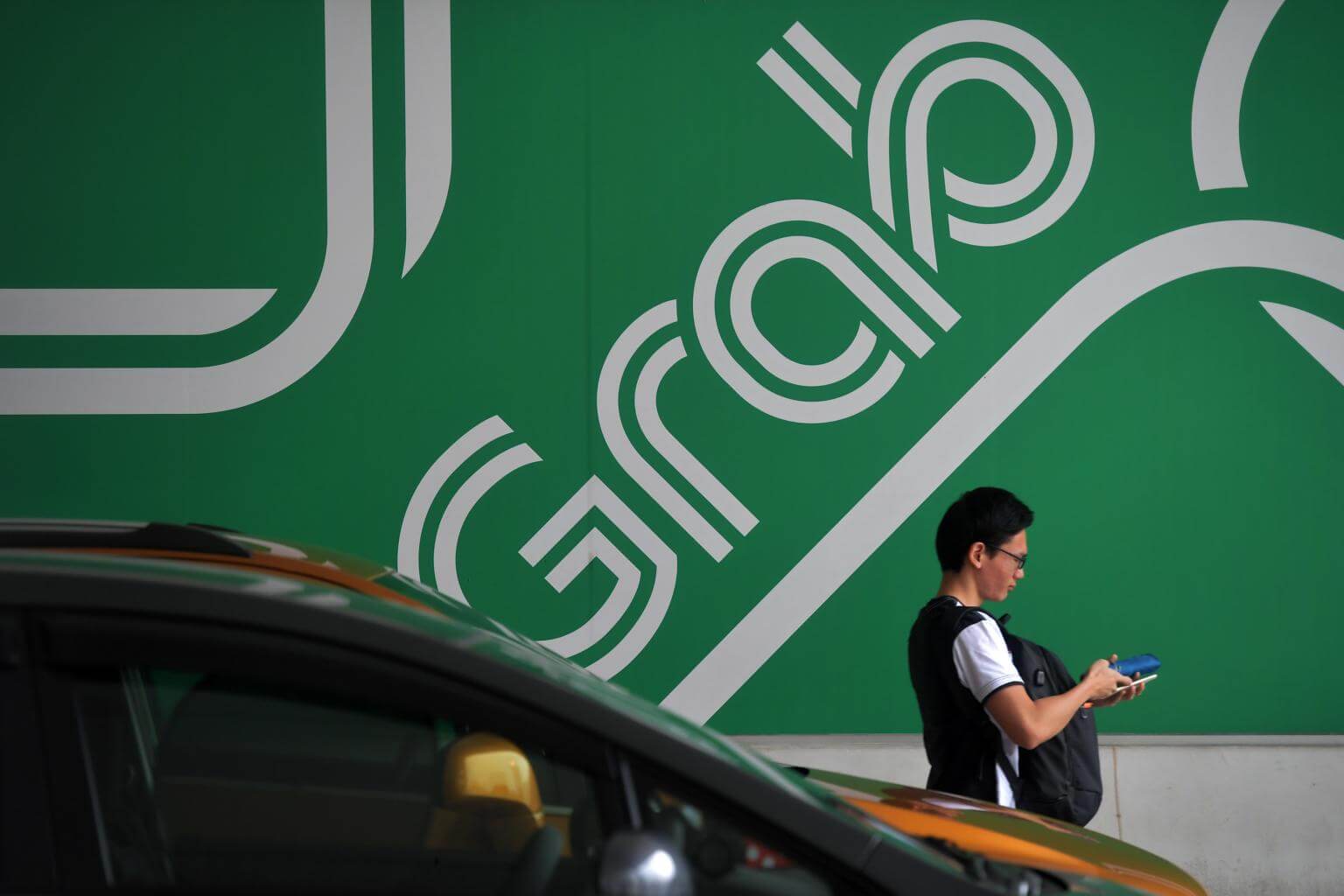 Grab inks deal with Mastercard on prepaid cards for millions in region ...