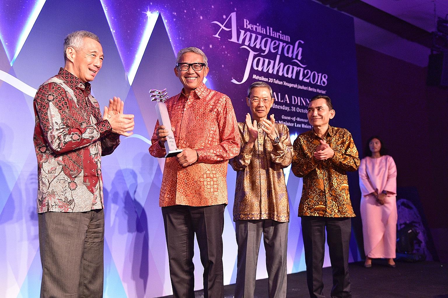 Top banker named BH Achiever of the Year | The Straits Times