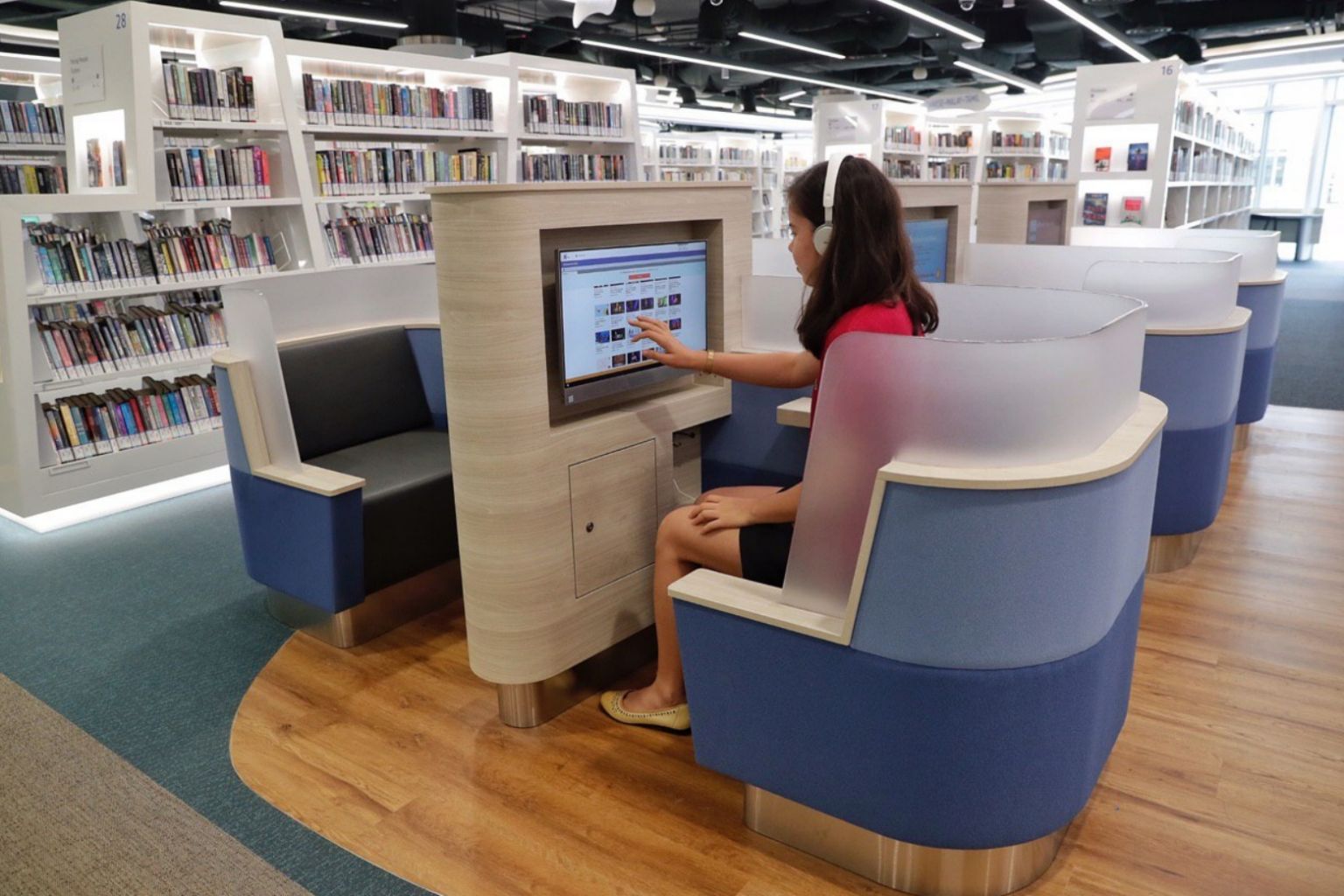 Biggest shopping mall library offering views of Sentosa to open in ...