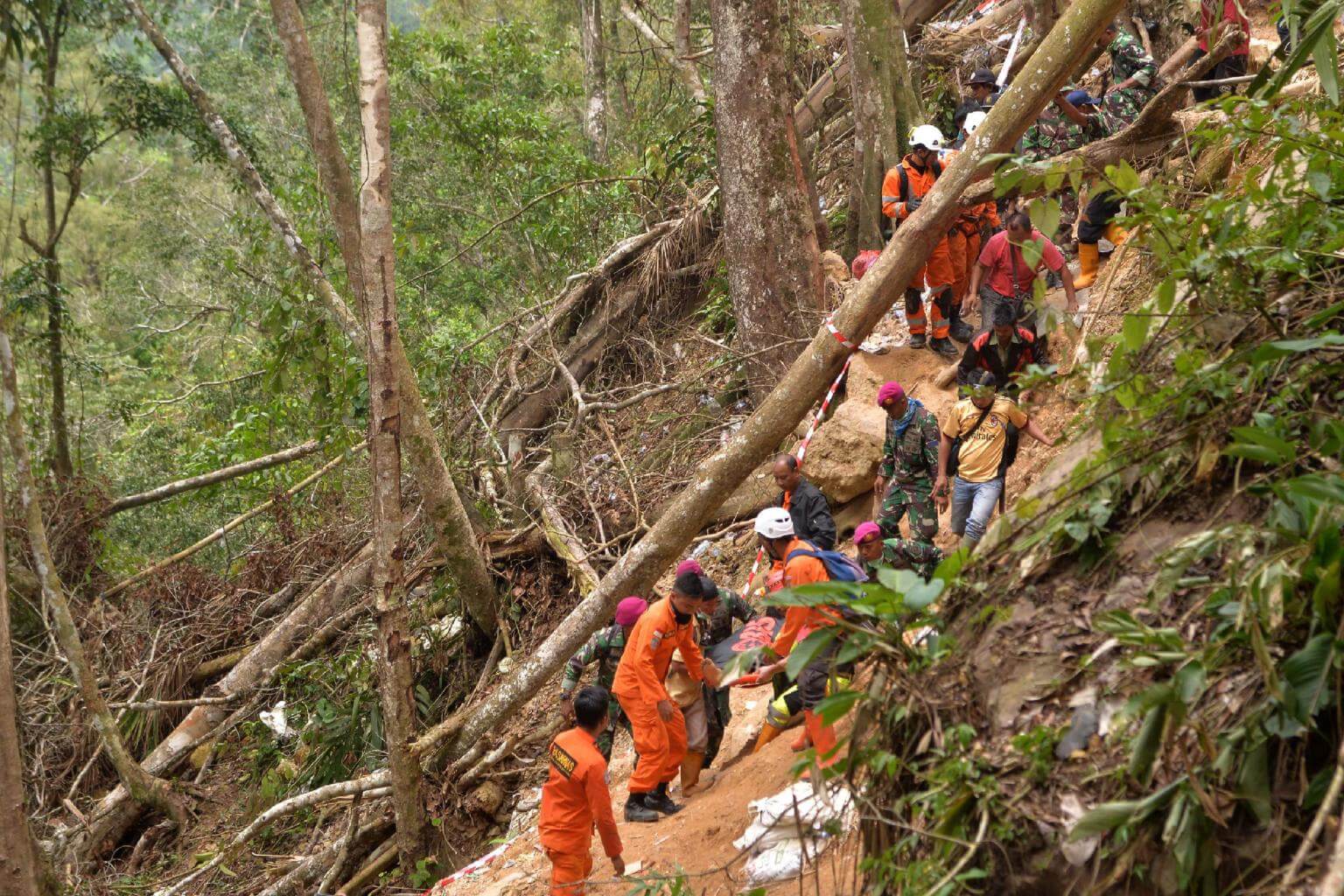 Indonesian rescuers amputate miner's leg to save him from collapsed ...