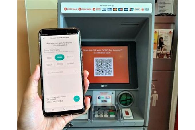 New OCBC initiative lets customers withdraw cash at ATMs using QR codes | The Straits Times