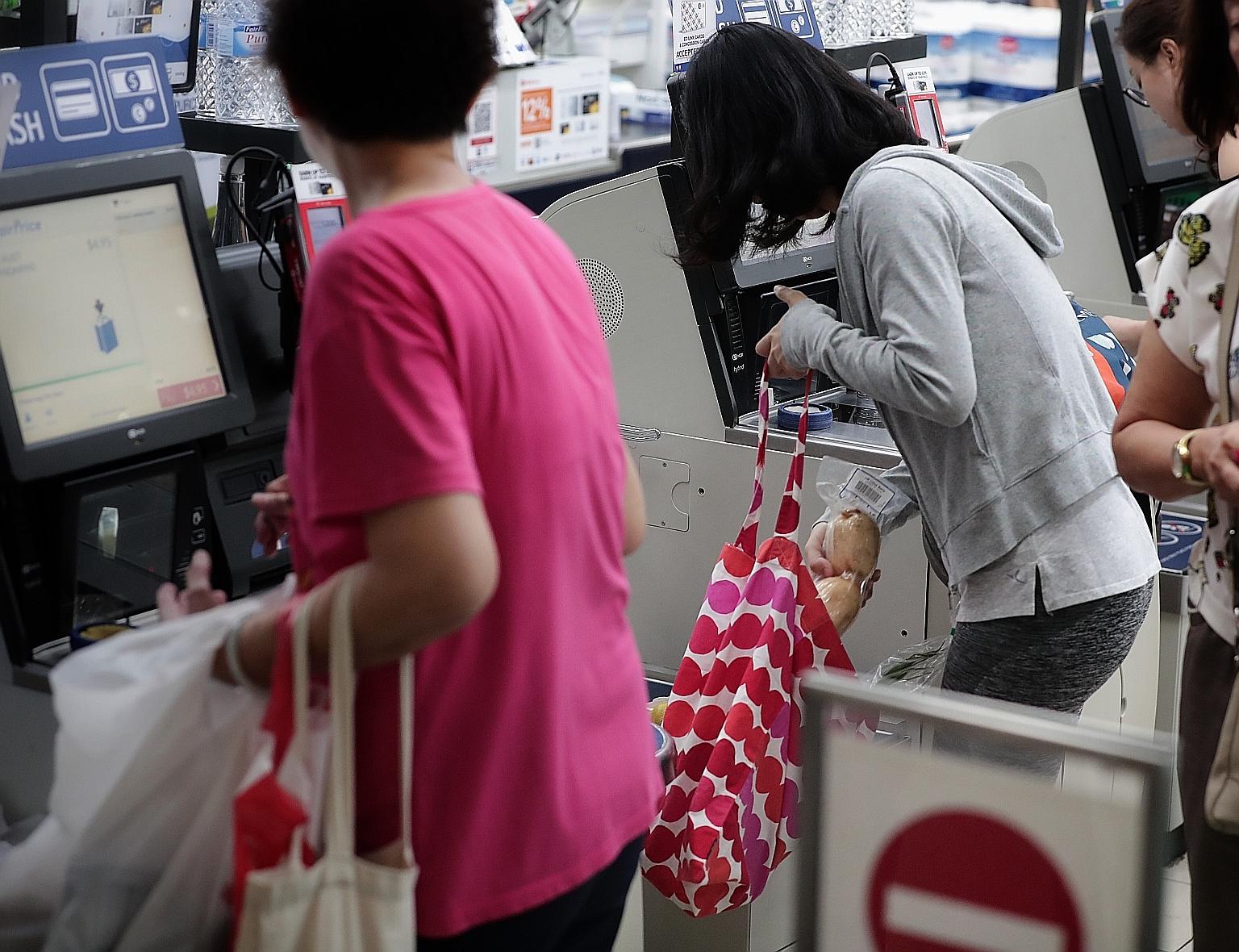 FairPrice to charge for plastic bags for a year at 25 outlets | The ...