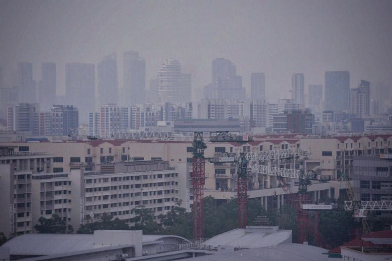 Slight haze due to build-up of particles in the air: NEA | The Straits ...