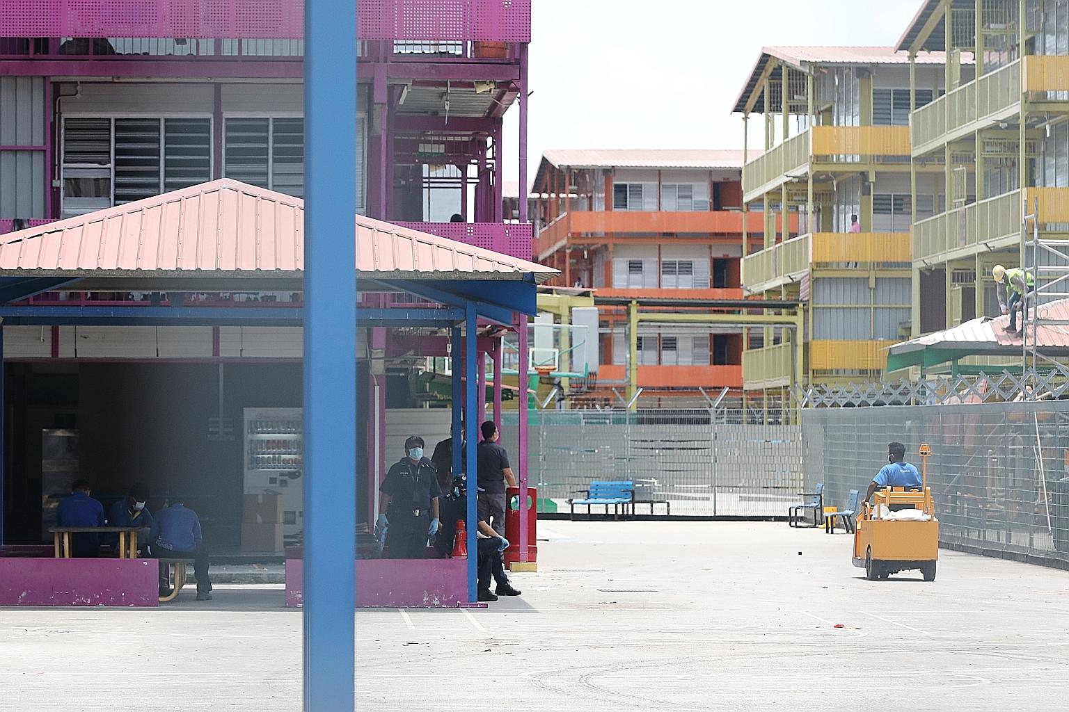 Spike in dorm coronavirus cases; 9th death reported | The Straits Times