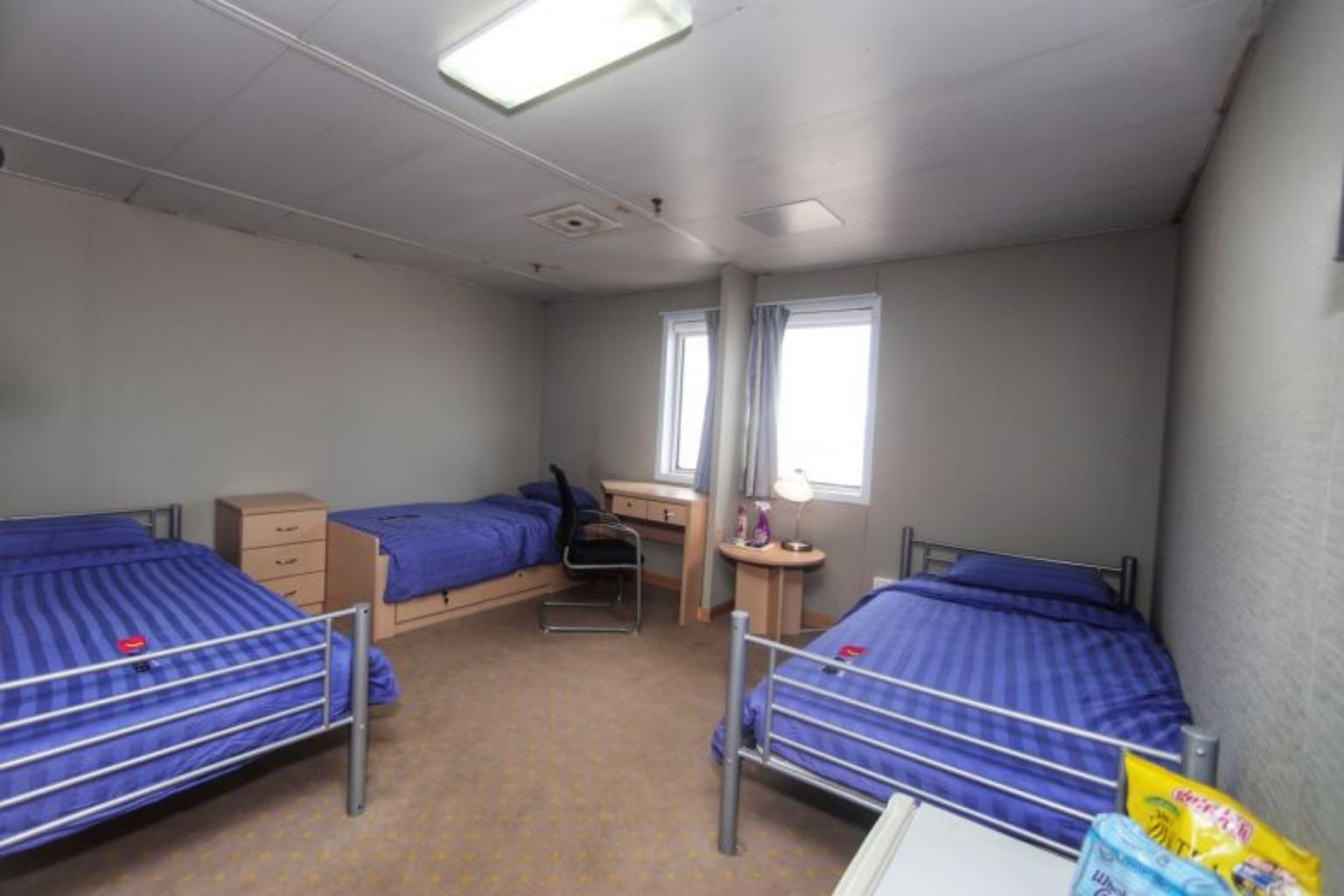 Coronavirus: MOM steps up checks at factory-converted dorms for workers ...