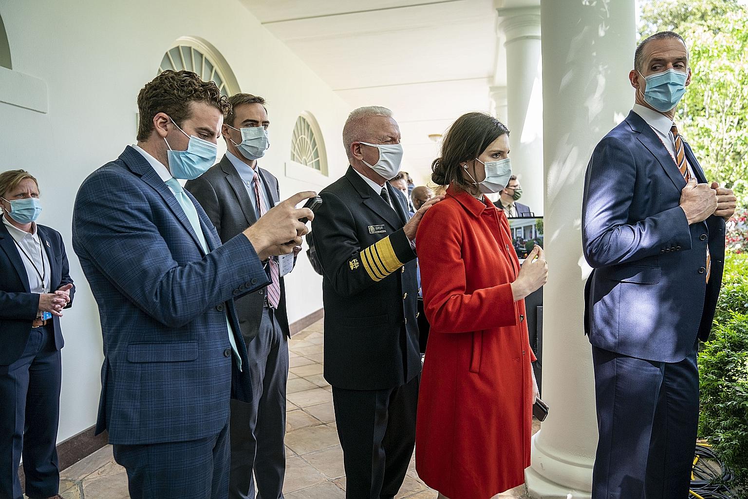 White House directs staff to wear masks | The Straits Times