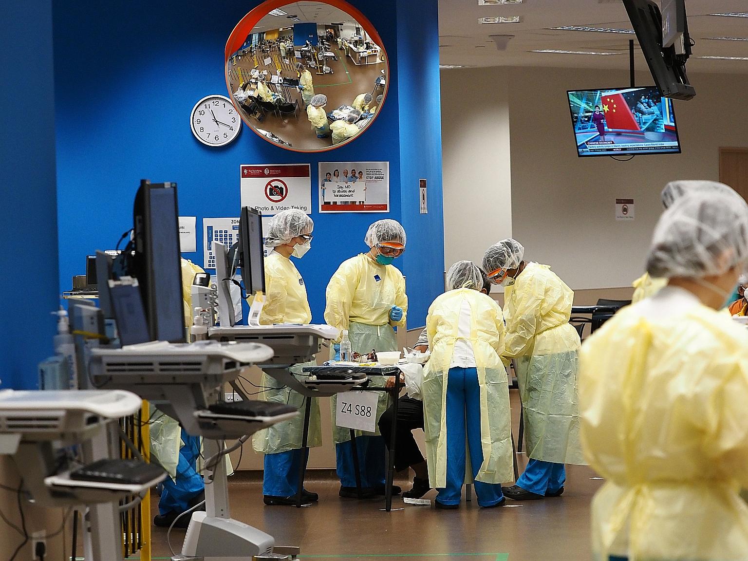 At ground zero: First-line defenders at TTSH-NCID's Covid-19 screening ...