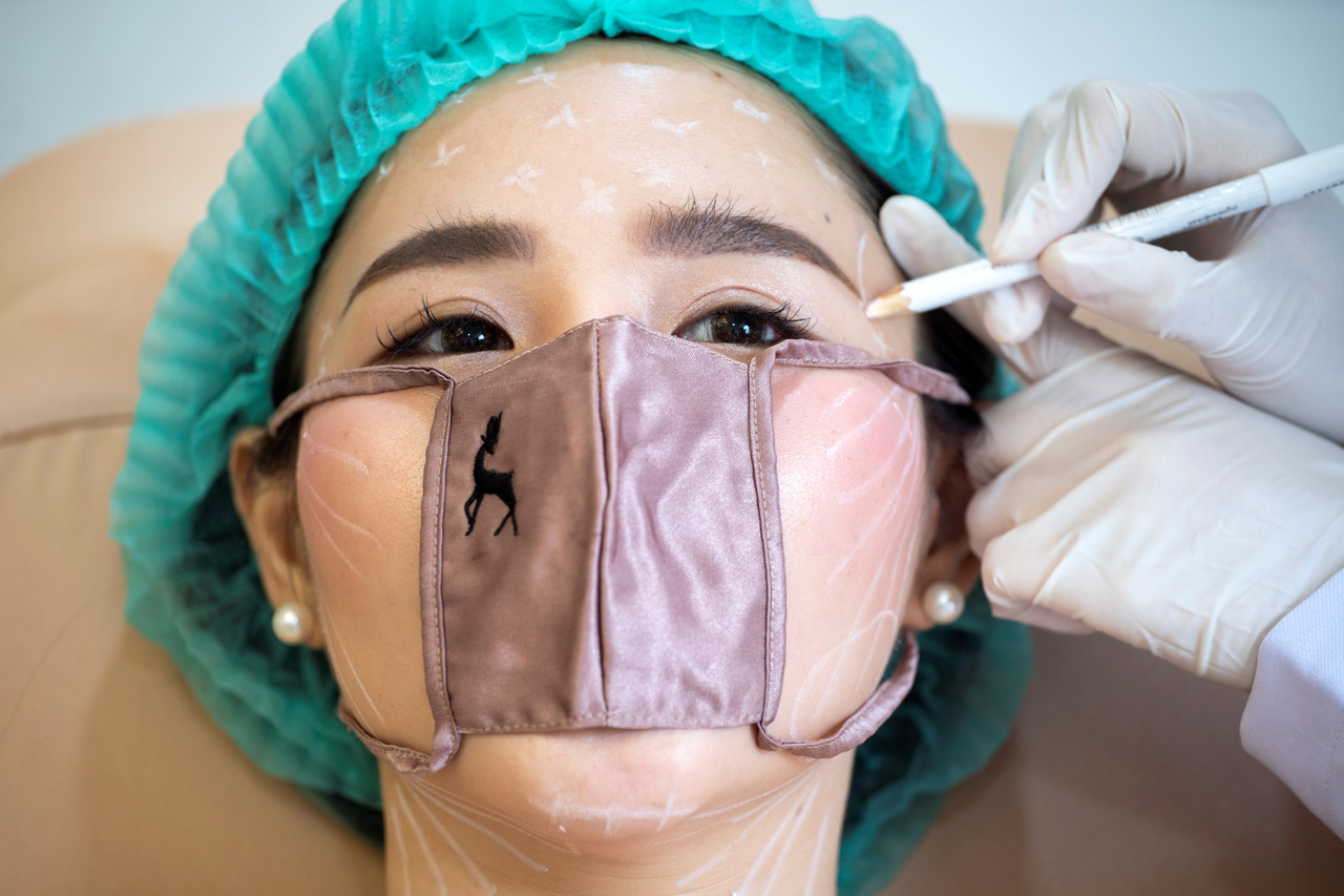 Coronavirus: Thai clinic offers mini face mask for up close beauty ...