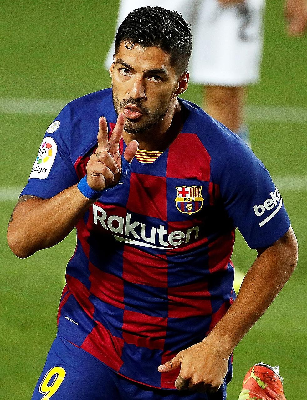 Suarez urges Barca to win remaining 3 games | The Straits Times