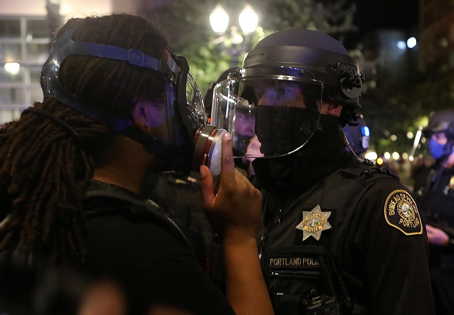 Portland police clash with anti-racism protesters, press | The Straits ...