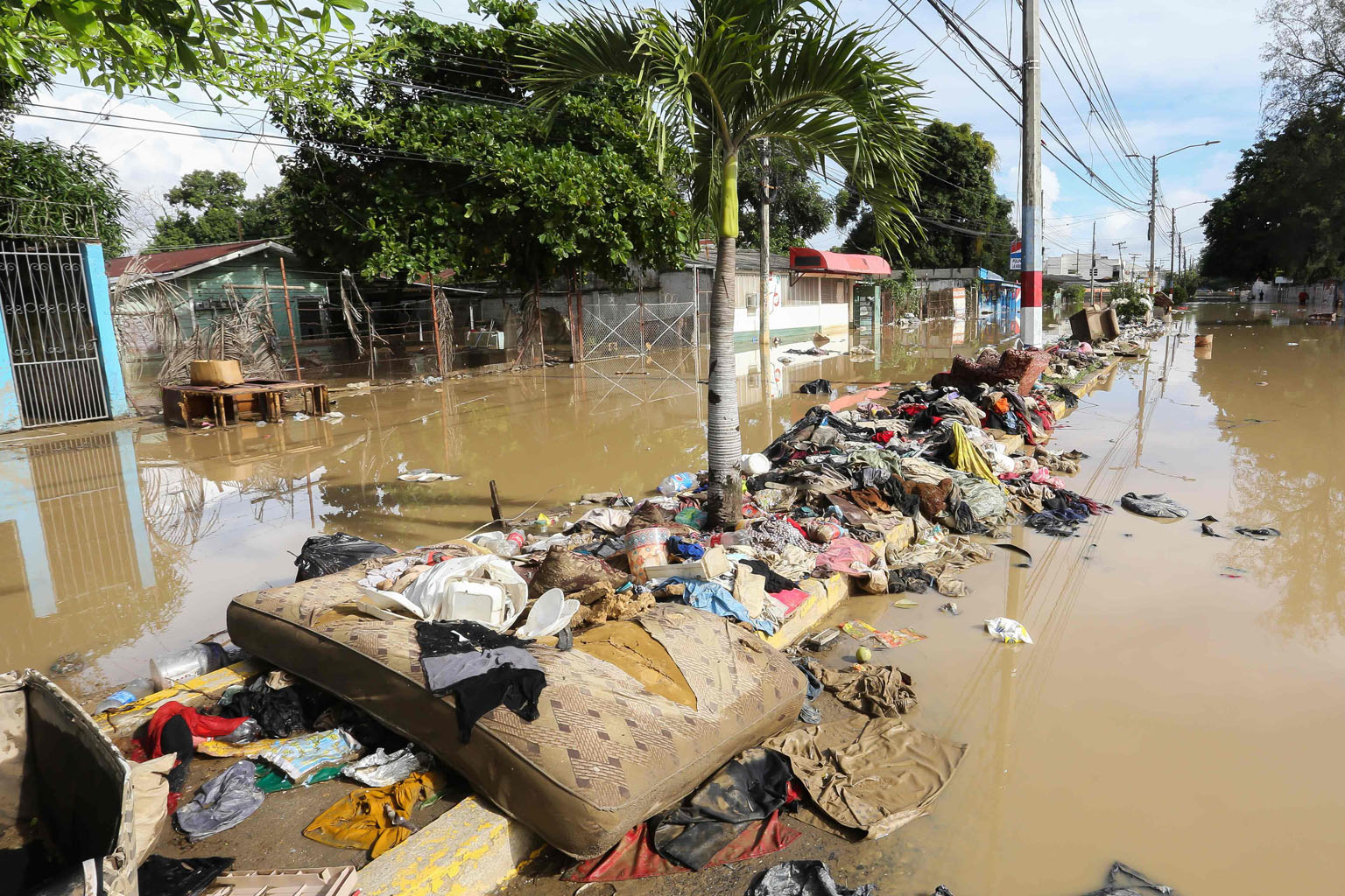 Honduran leader pleads for help as storm death toll rises | The Straits ...