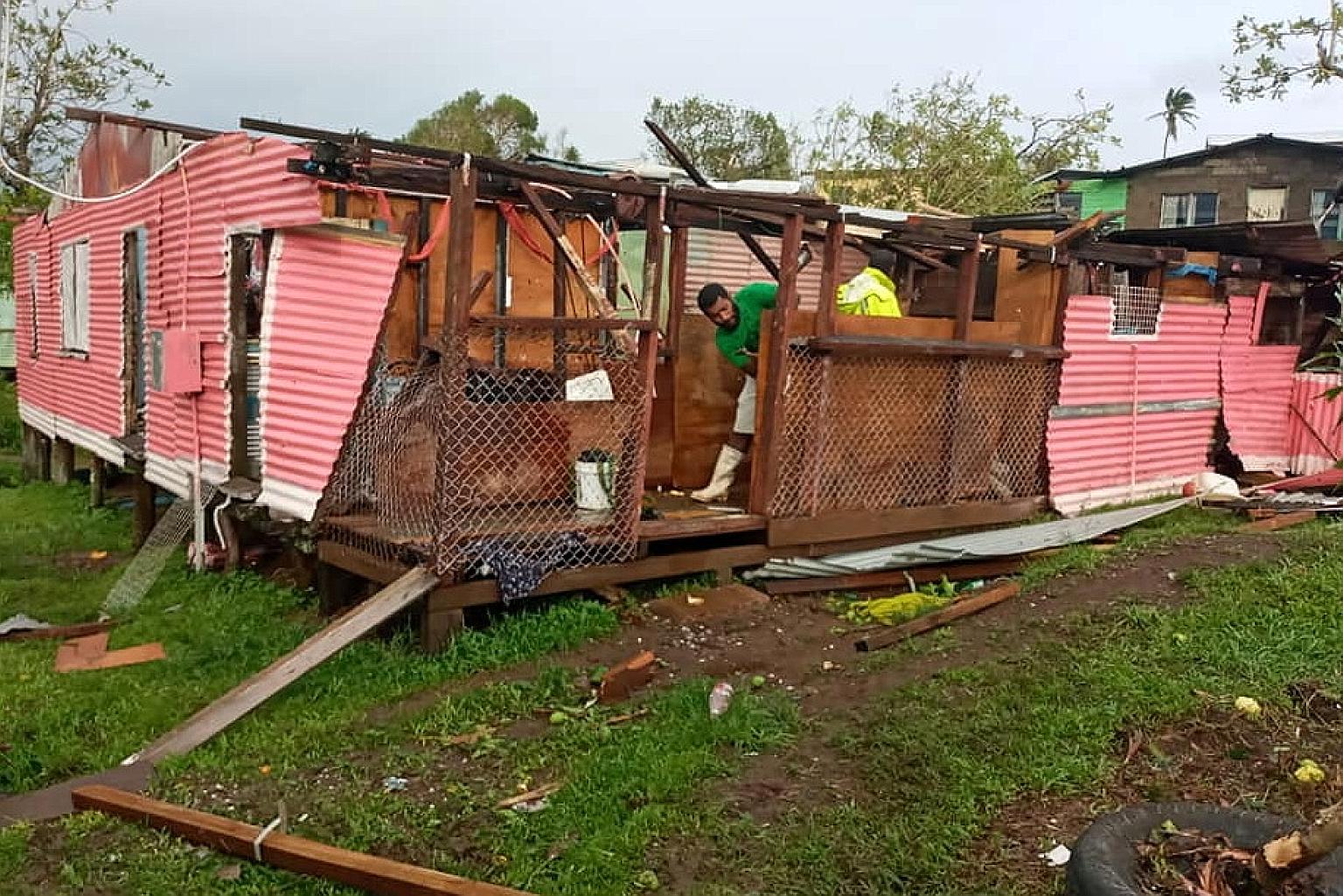 Villages flattened, baby killed as super cyclone hits Fiji | The ...