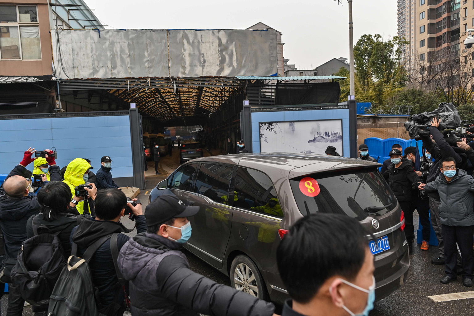 WHO probe team in Wuhan visits market at heart of first outbreak | The ...