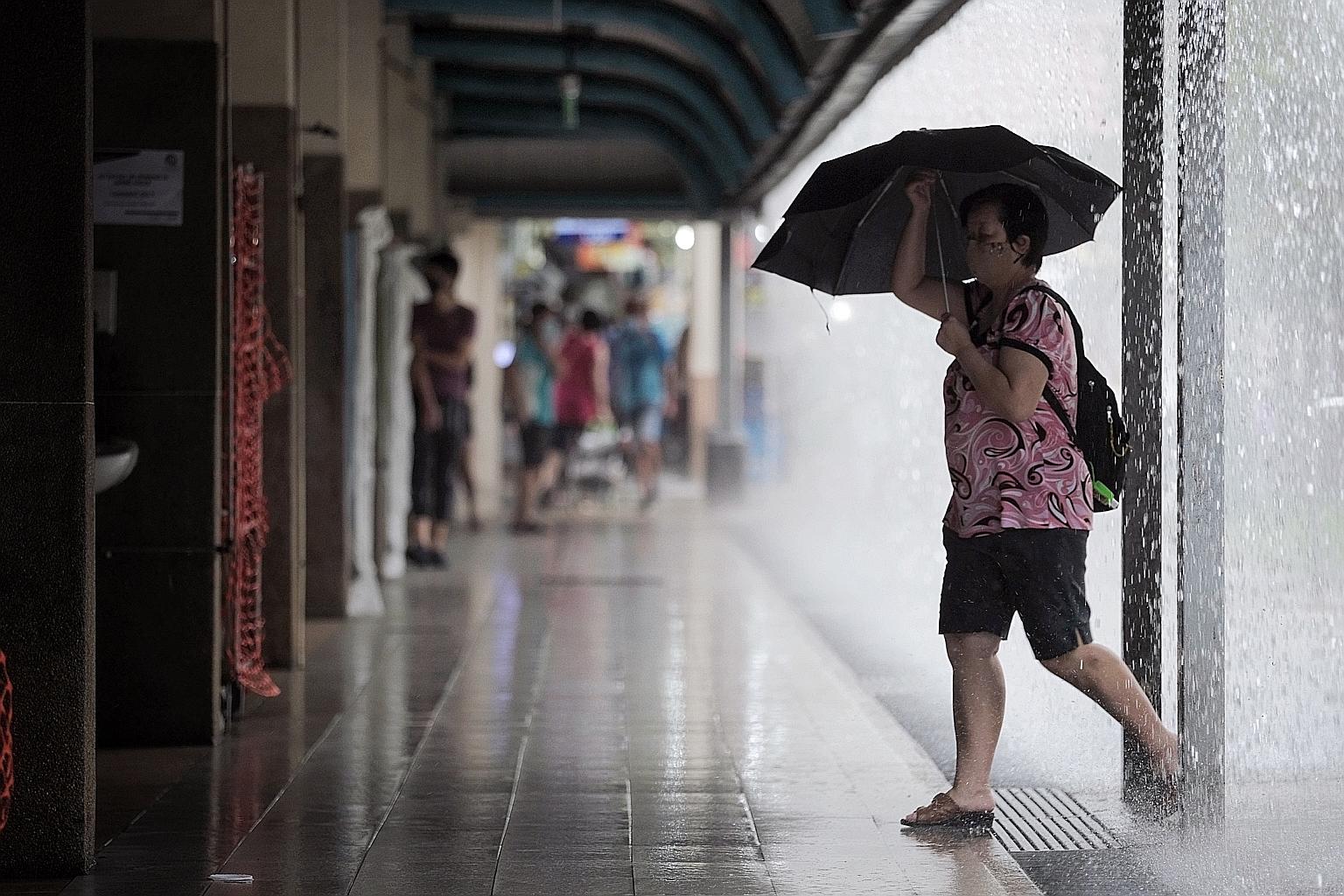 Wet mornings, warm nights ahead | The Straits Times