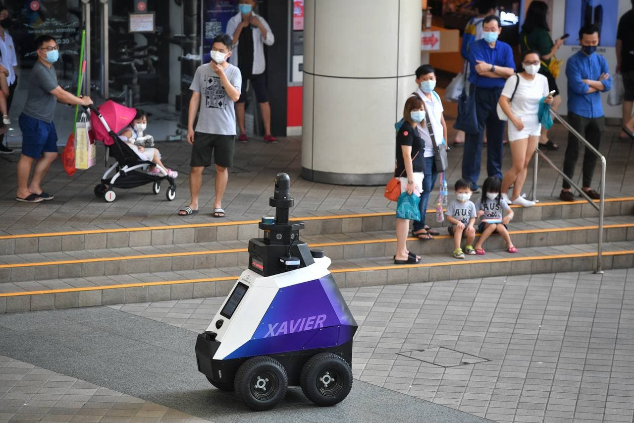 Autonomous robots check on bad behaviour in Singapore's heartland | The ...
