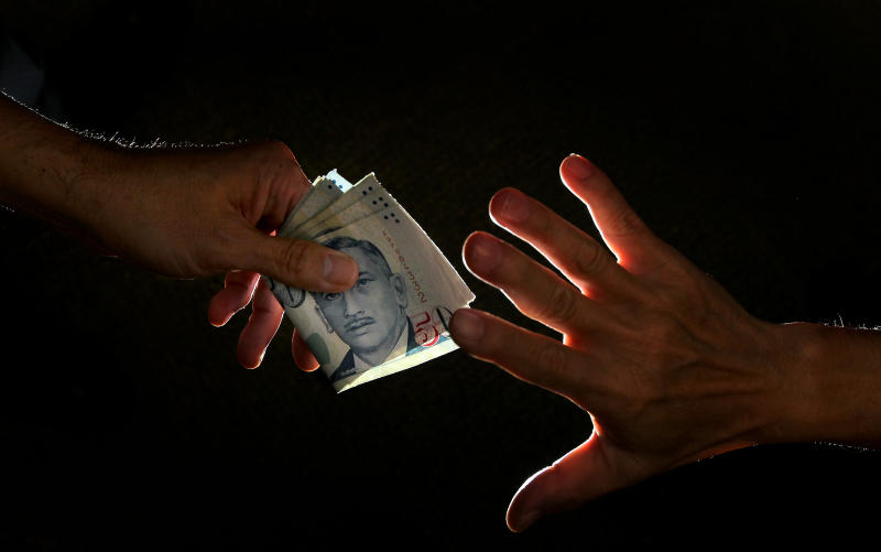 S'pore man to be charged over allegedly receiving more than $250,000 in ...