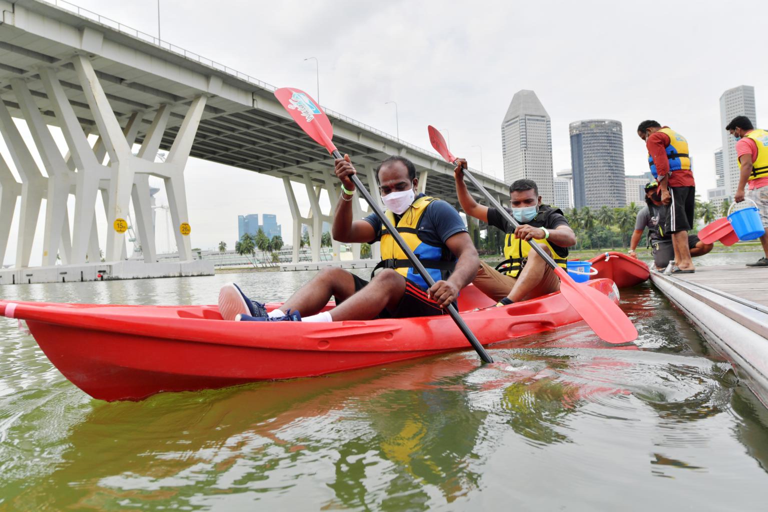 Kayaking, cricket and cheer as foreign workers mark International ...
