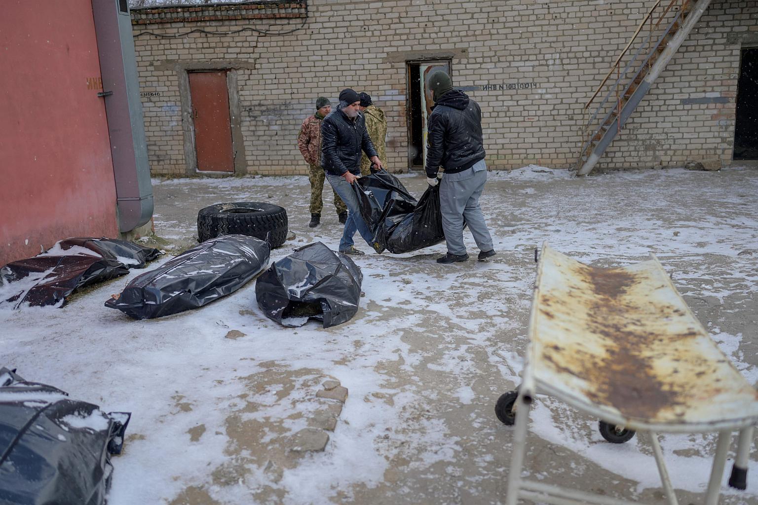 In a Mykolaiv morgue, corpses pile up in the snow | The Straits Times