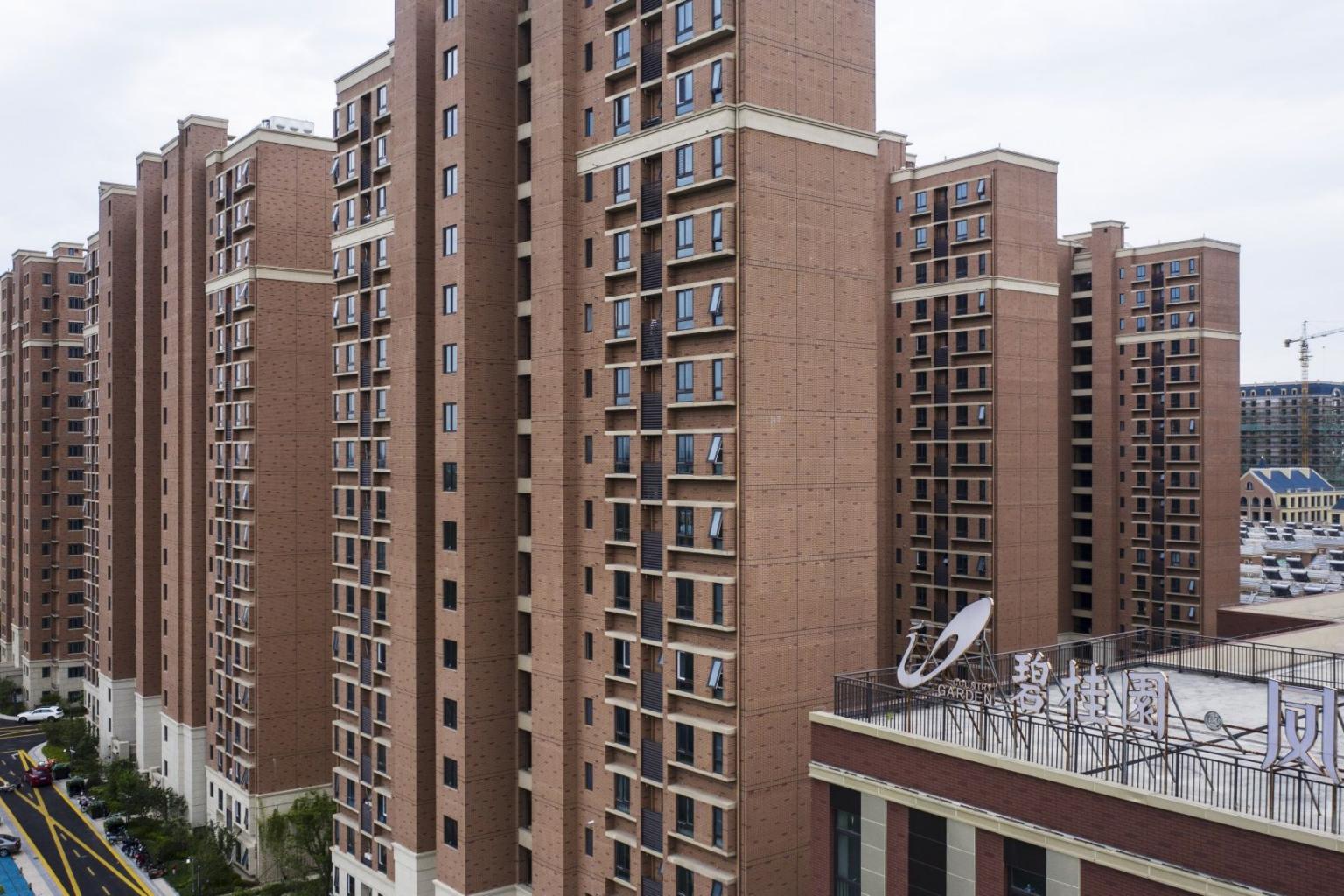 Chinese cities arrange group home buying to try to boost market | The ...