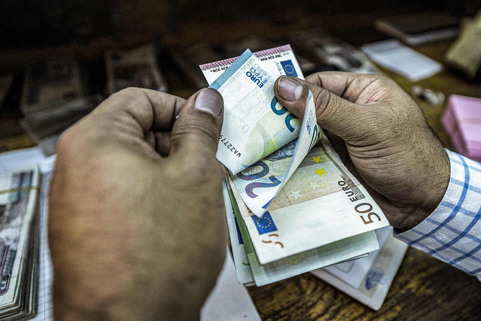 Euro climbs to three-week high on Ukraine gains, rates outlook | The ...