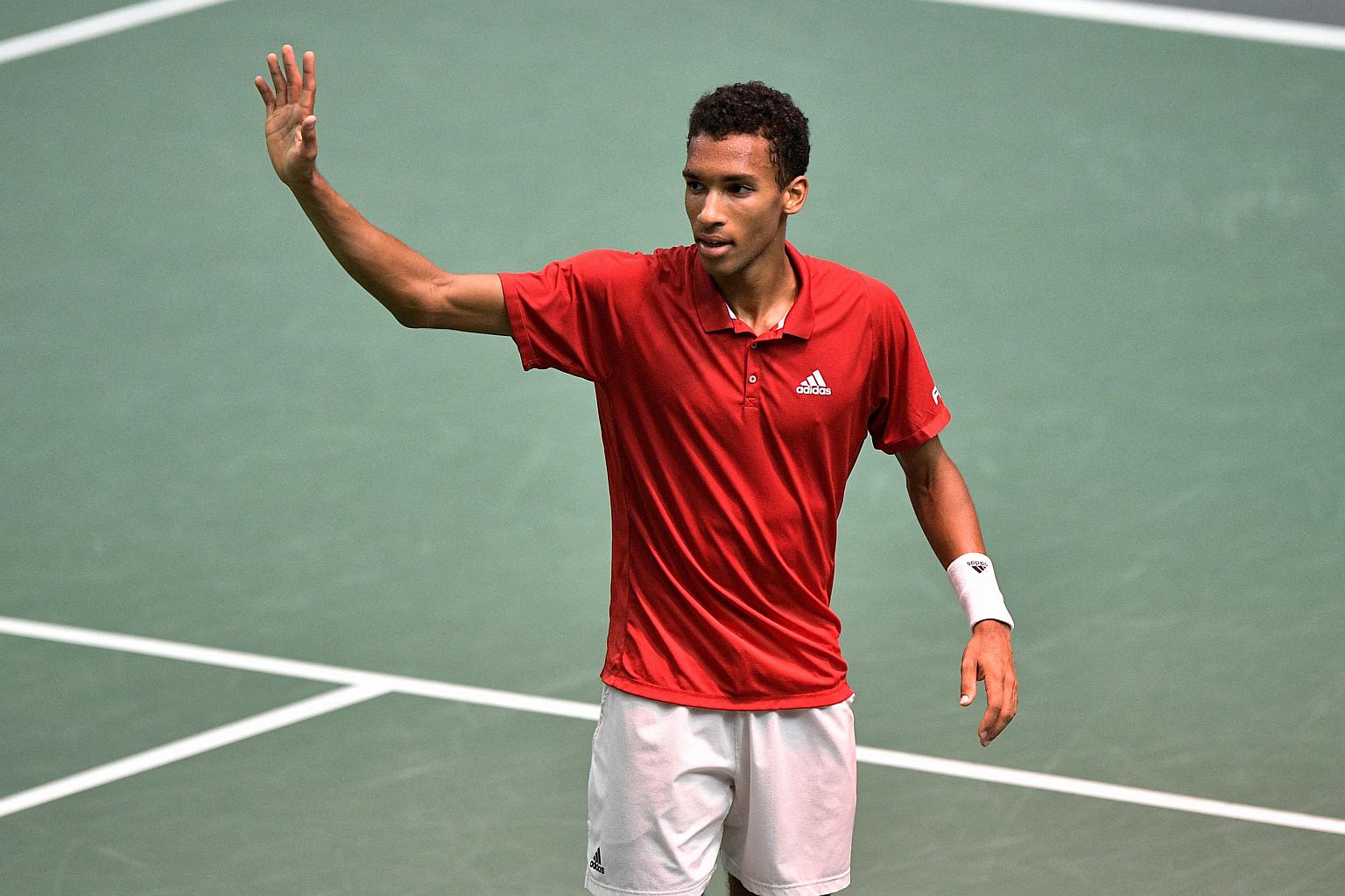 Tennis: Auger-Aliassime helps Canada seal Davis Cup quarter-final spot | The Straits Times