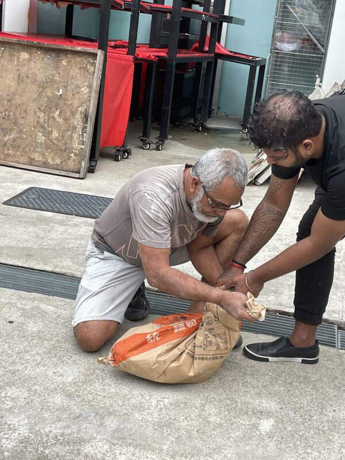 2m-long python injured while being pulled out of car in Marine Parade ...