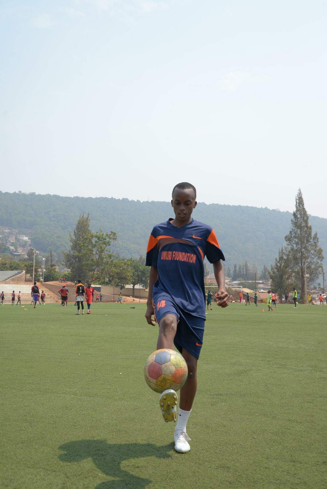 On Kigali’s pitches, young footballers endure tough conditions and ...