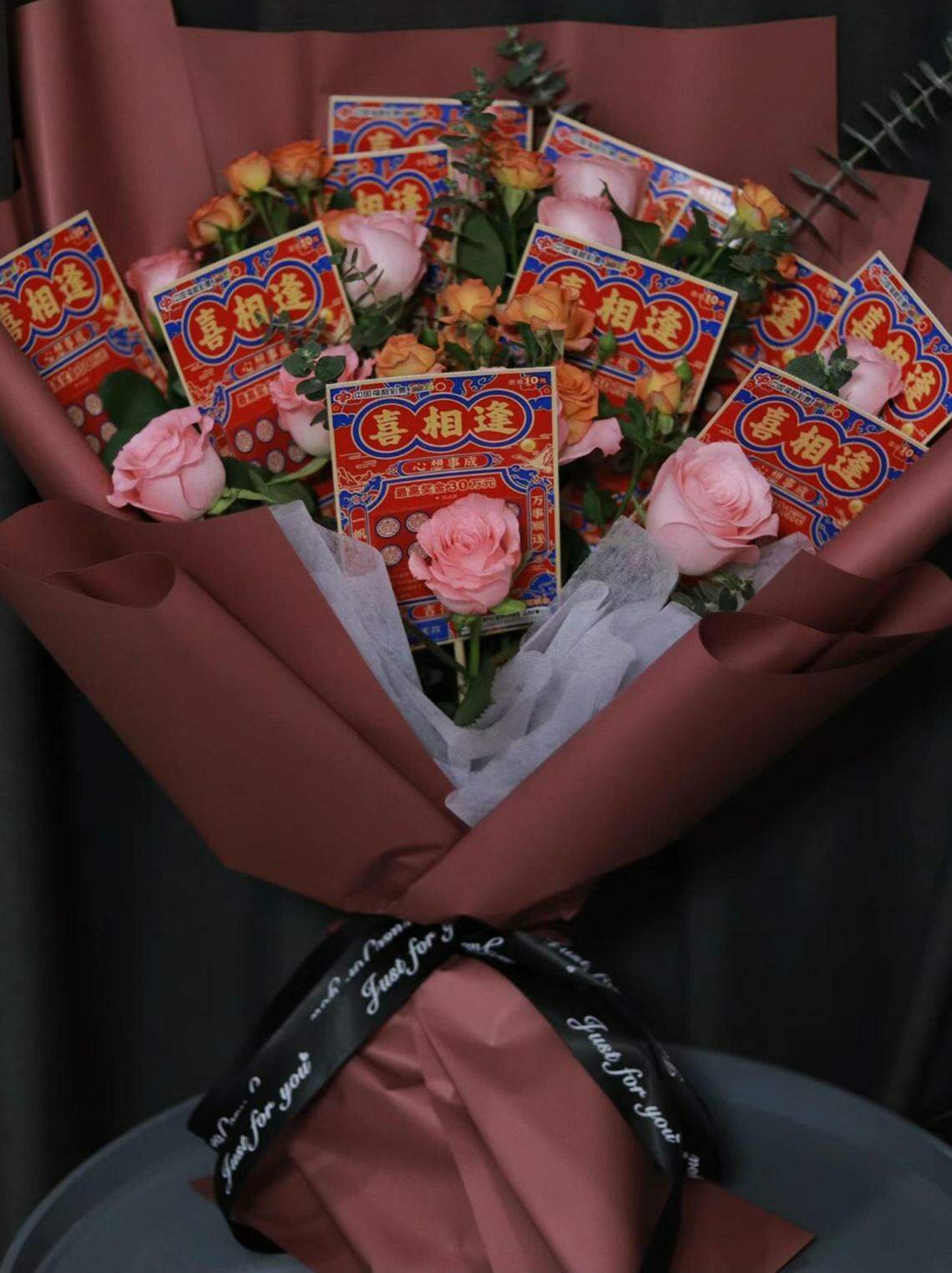 A cheap daydream: Young Chinese buy up lottery scratch cards amid ...