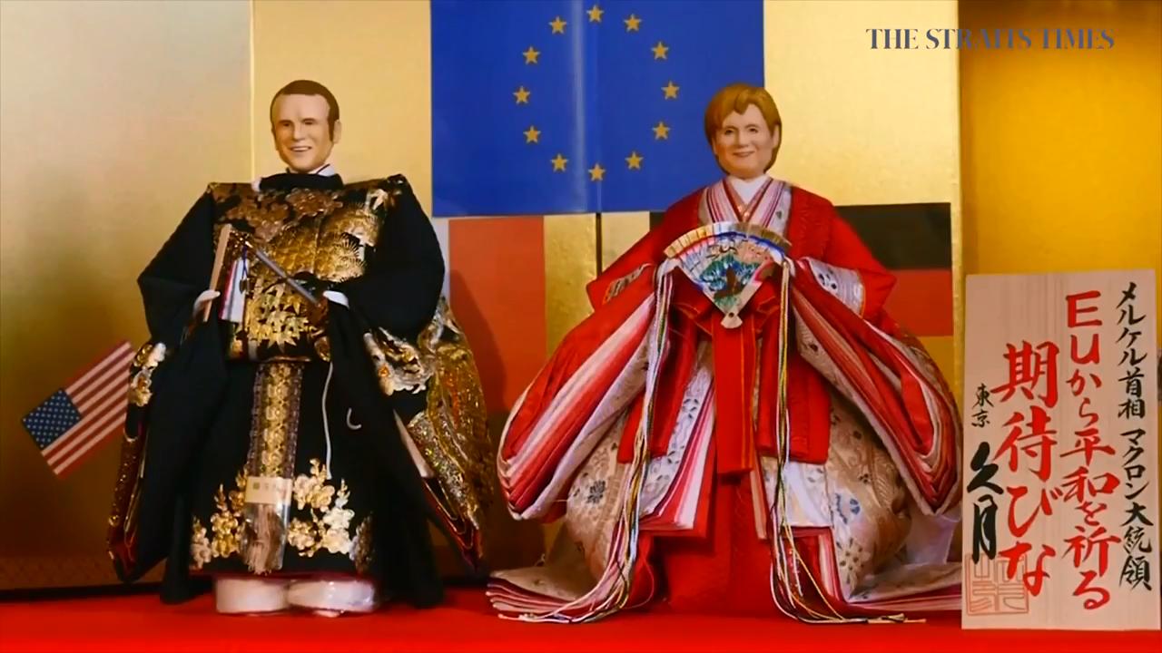 German Chancellor Angela Merkel and French President Emmanuel Macron ...