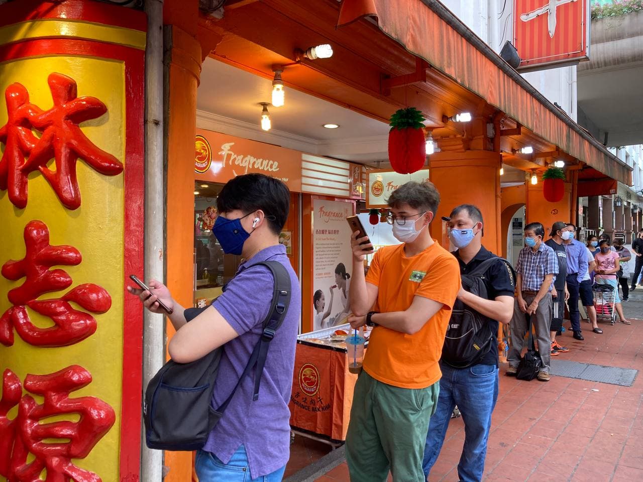 Long queues at Lim Chee Guan as it opens stores for walk-ins after ...
